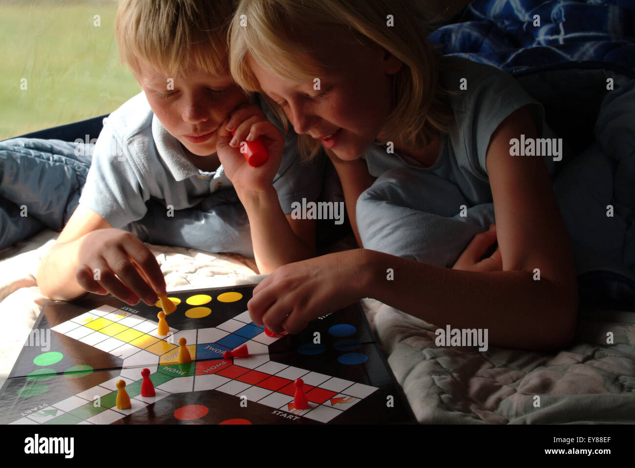 Children playing ludo together hi-res stock photography and images - Alamy