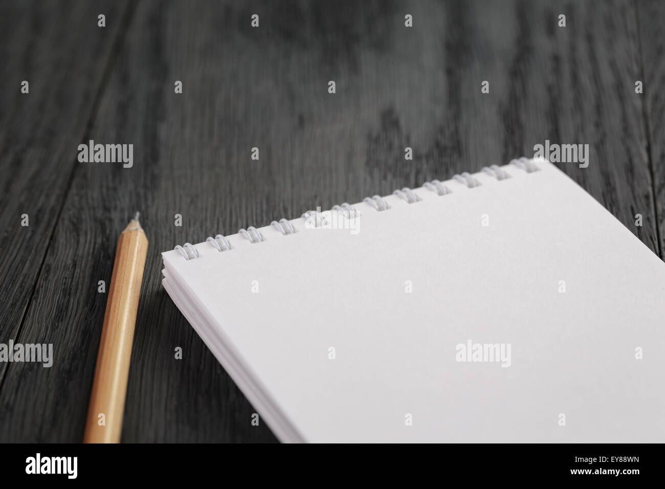 closeup photo of open empty notepad with pencil Stock Photo - Alamy