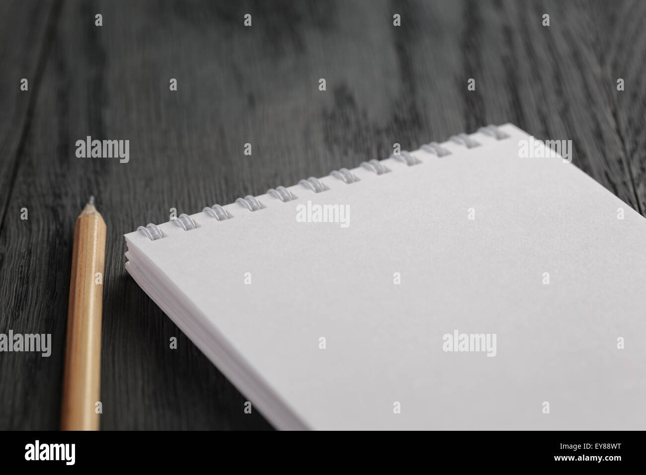 closeup photo of open empty notepad with pencil Stock Photo - Alamy