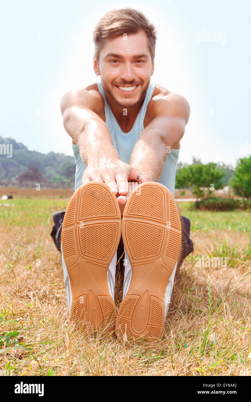 Nice guy doing exercises Stock Photo - Alamy