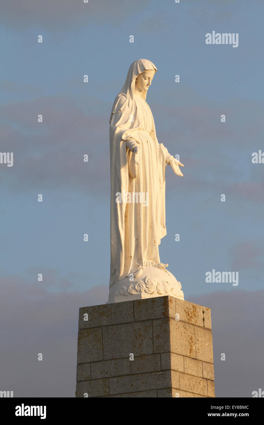 Statue of the Virgin Mary above Arromanches. Normandy. France Stock ...