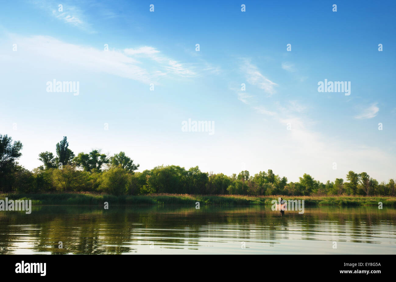 River landscape with sky reflection in water Stock Photo - Alamy