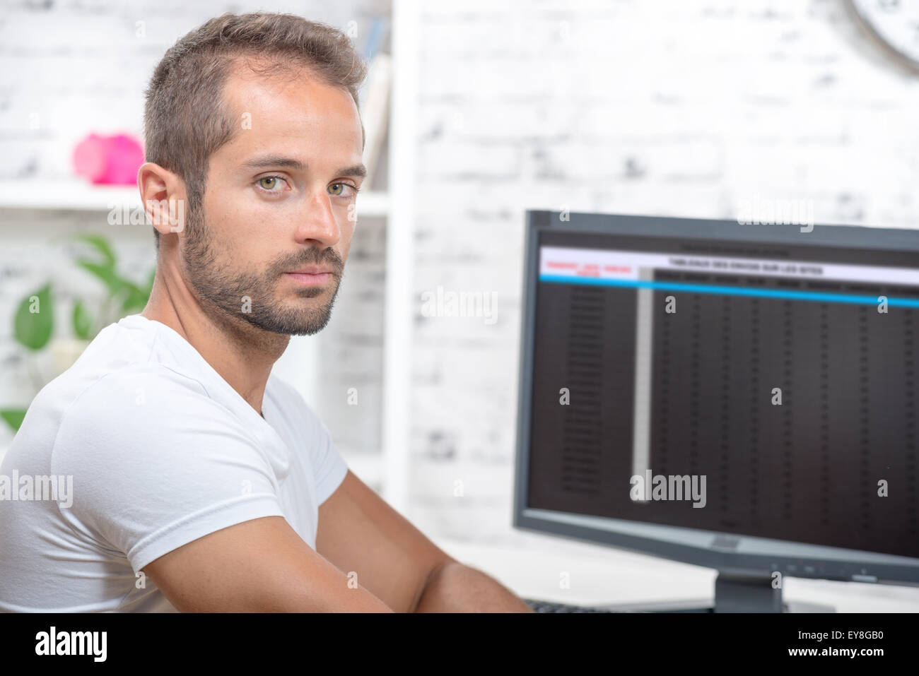 young executive working with his computer in his office Stock Photo - Alamy