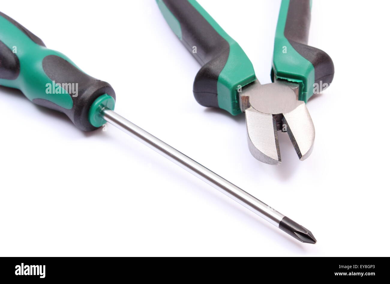 Electrical pliers and screwdriver isolated on white background, work ...