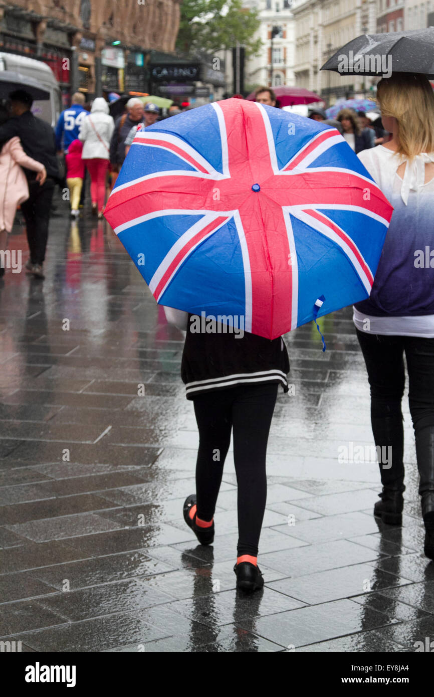 London,UK. 24th July 2015. Londoners endured a wet rainy day in London ...