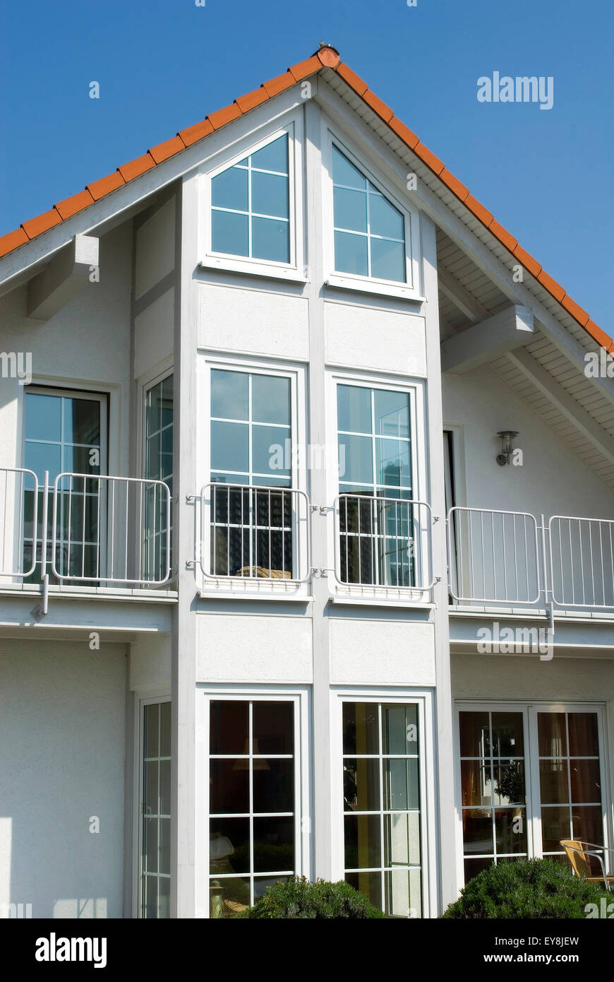 Facade of a building with windows Stock Photo - Alamy