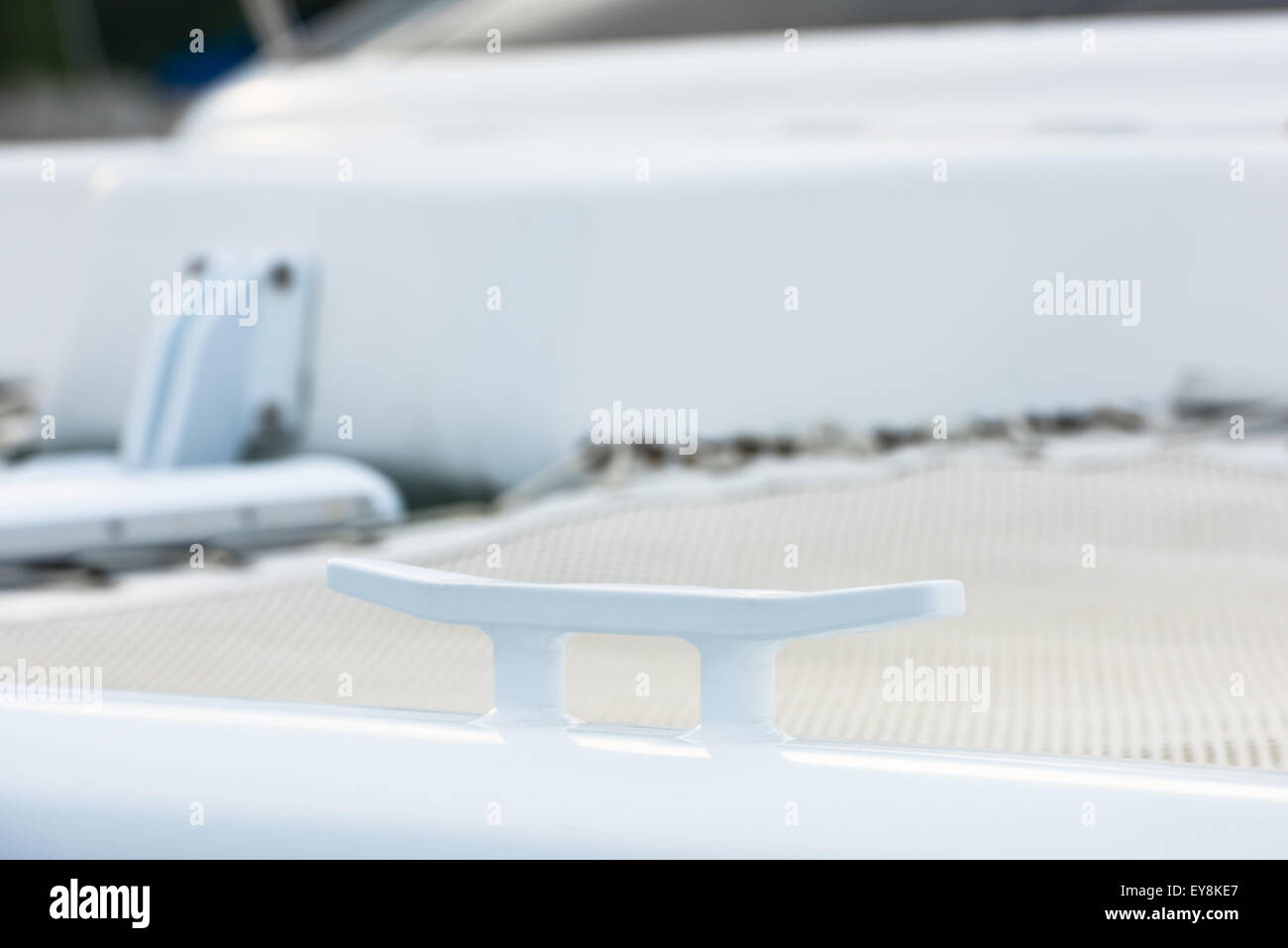 Closeup of white Cleat on a dock pier. horizontal shot with small GRIP ...