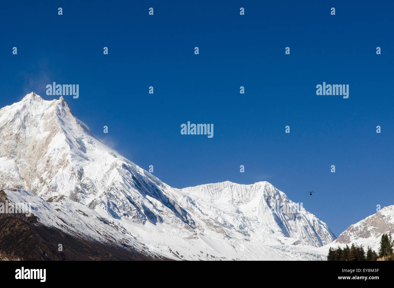 the view of Mt. Manaslu from the village of Lho in the Nubri valley of ...