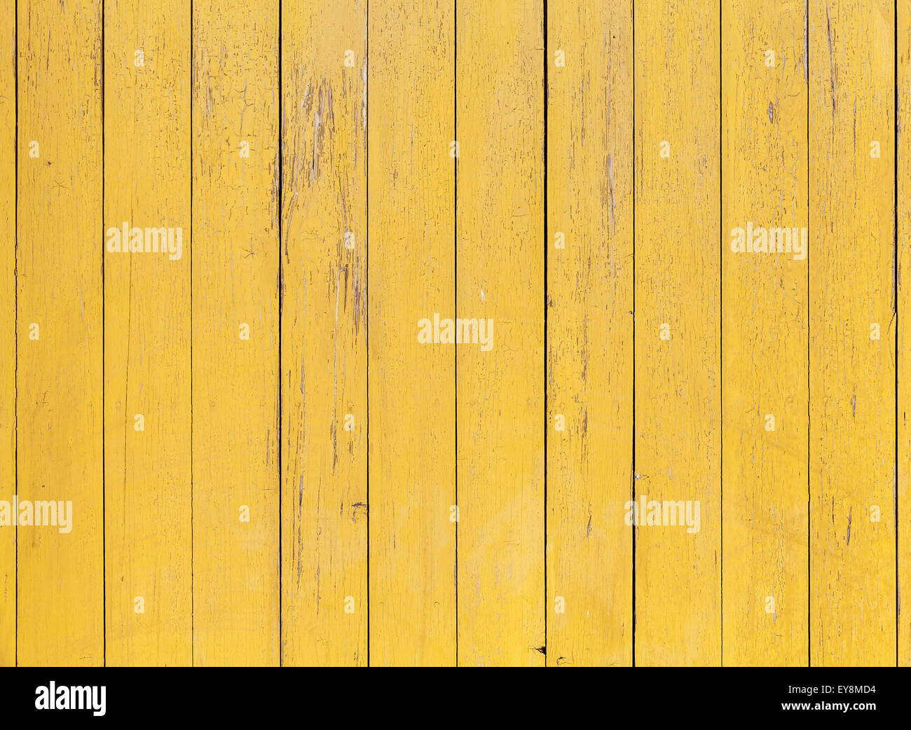 Old yellow wooden wall with cracked paint layer, detailed background ...