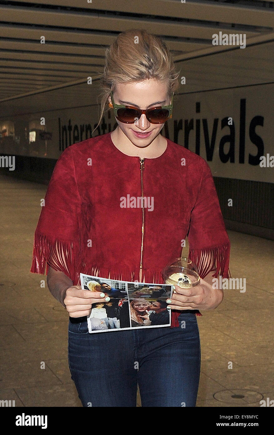 Pixie Lott and her boyfriend Oliver Cheshire arrive at Heathrow Airport ...
