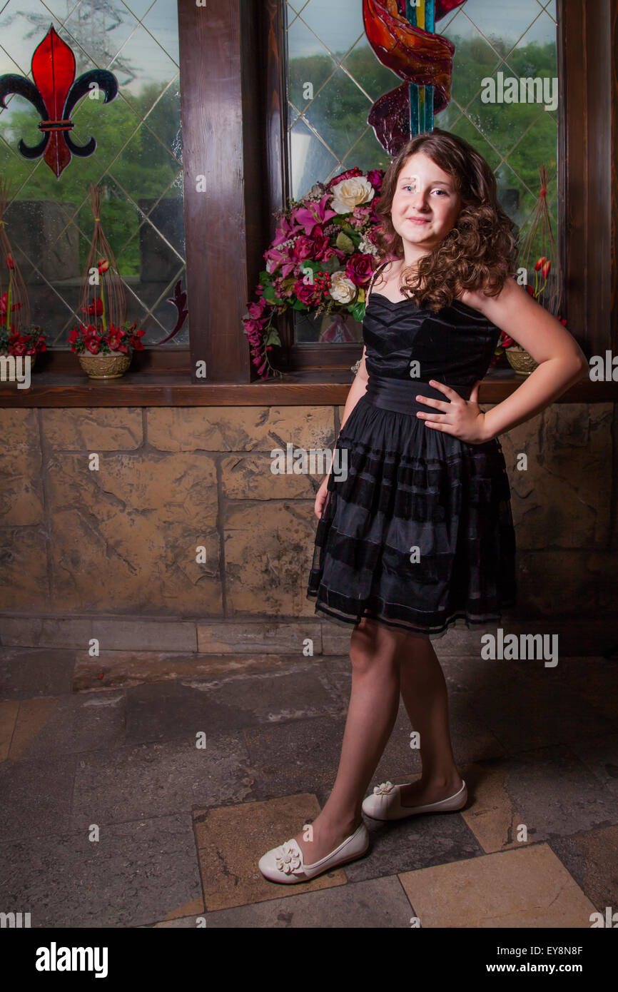 Portrait of a 10 year old girl posing in a castle Stock Photo - Alamy