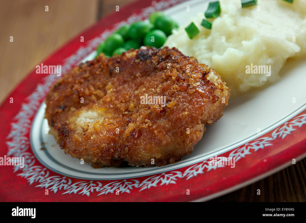 Kotlet schabowy - Polish variety of pork breaded cutlet coated with ...