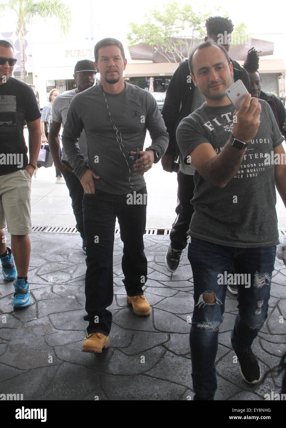 Mark Wahlberg and Chicago Bulls player Jimmy Butler leave E. Baldi ...