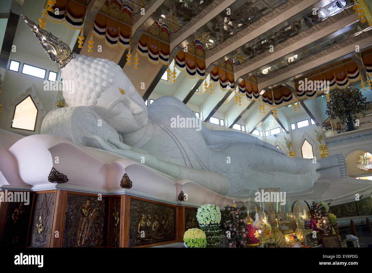 A big laying down Buddha at Wat Pa Phu Kon temple, Thailand Stock Photo ...