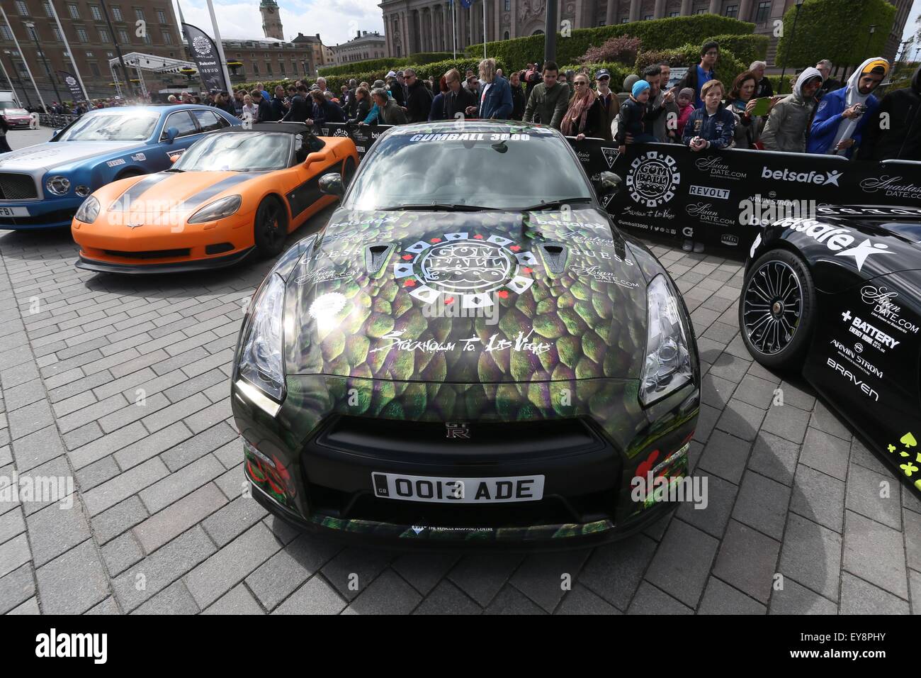 Cars arrive at the grid for the launch of the Gumball 3000 car rally ...
