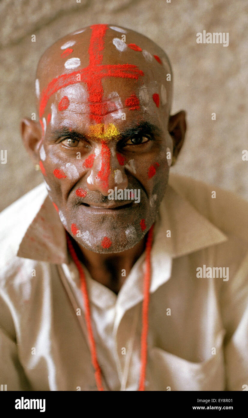 Portrait of man attending festival in Vrindivan India with powder on ...
