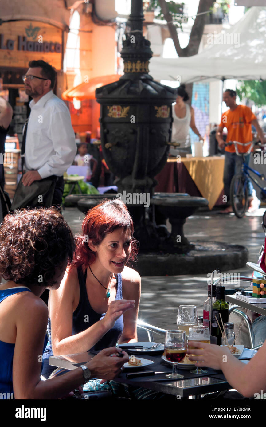 people sitting in open terrace cafe Stock Photo - Alamy