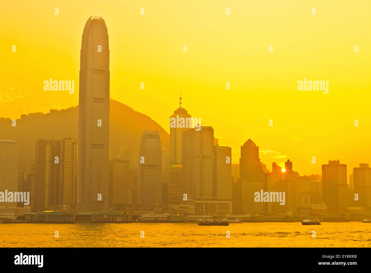 Hong Kong sunset at Victoria Harbor Stock Photo - Alamy