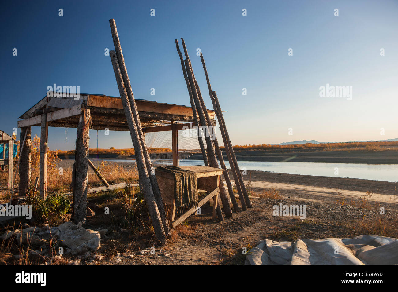 Wooden fish drying rack on the bank of the Noatak River; Noatak, Alaska ...