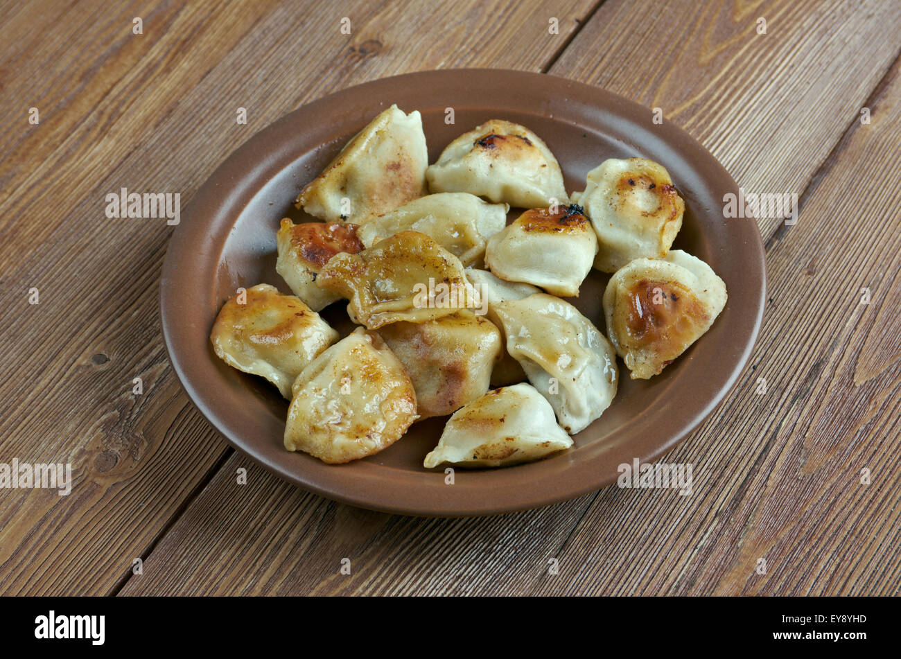 Homemade fish fried dumplings close up Stock Photo - Alamy