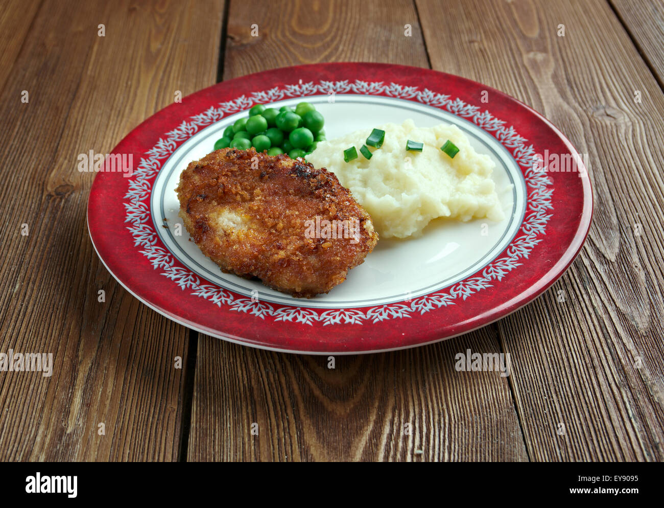 Kotlet schabowy - Polish variety of pork breaded cutlet coated with ...
