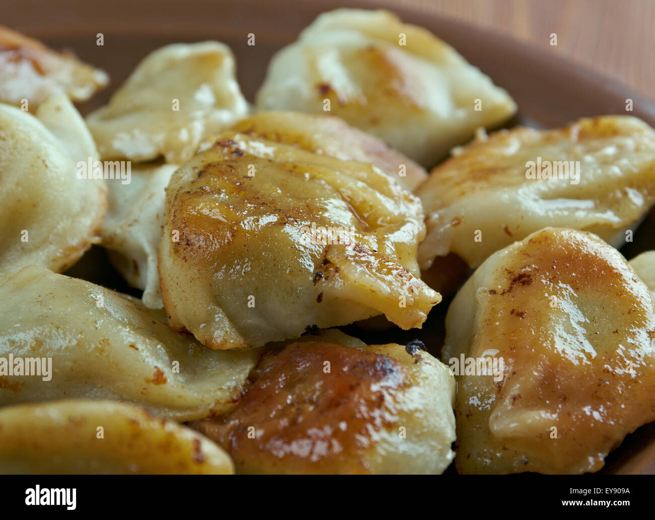Homemade fish fried dumplings close up Stock Photo - Alamy
