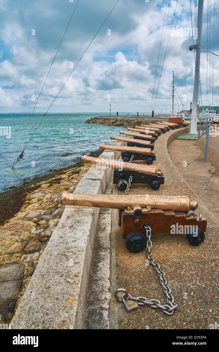 A row of cannon outside the start line at the yacht club in Cowes, Isle ...