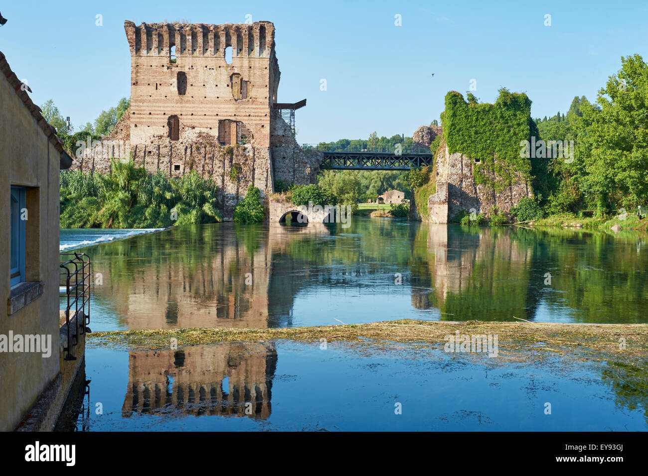 BORGHETTO, ITALY - JULY 11: Ruin of tower at Visconteo bridge coasted ...