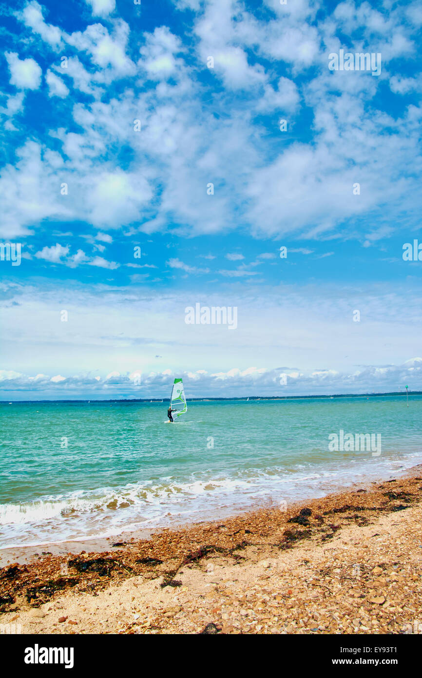 A windsurfer off the coast of Cowes in the Isle of Wight, UK Stock ...