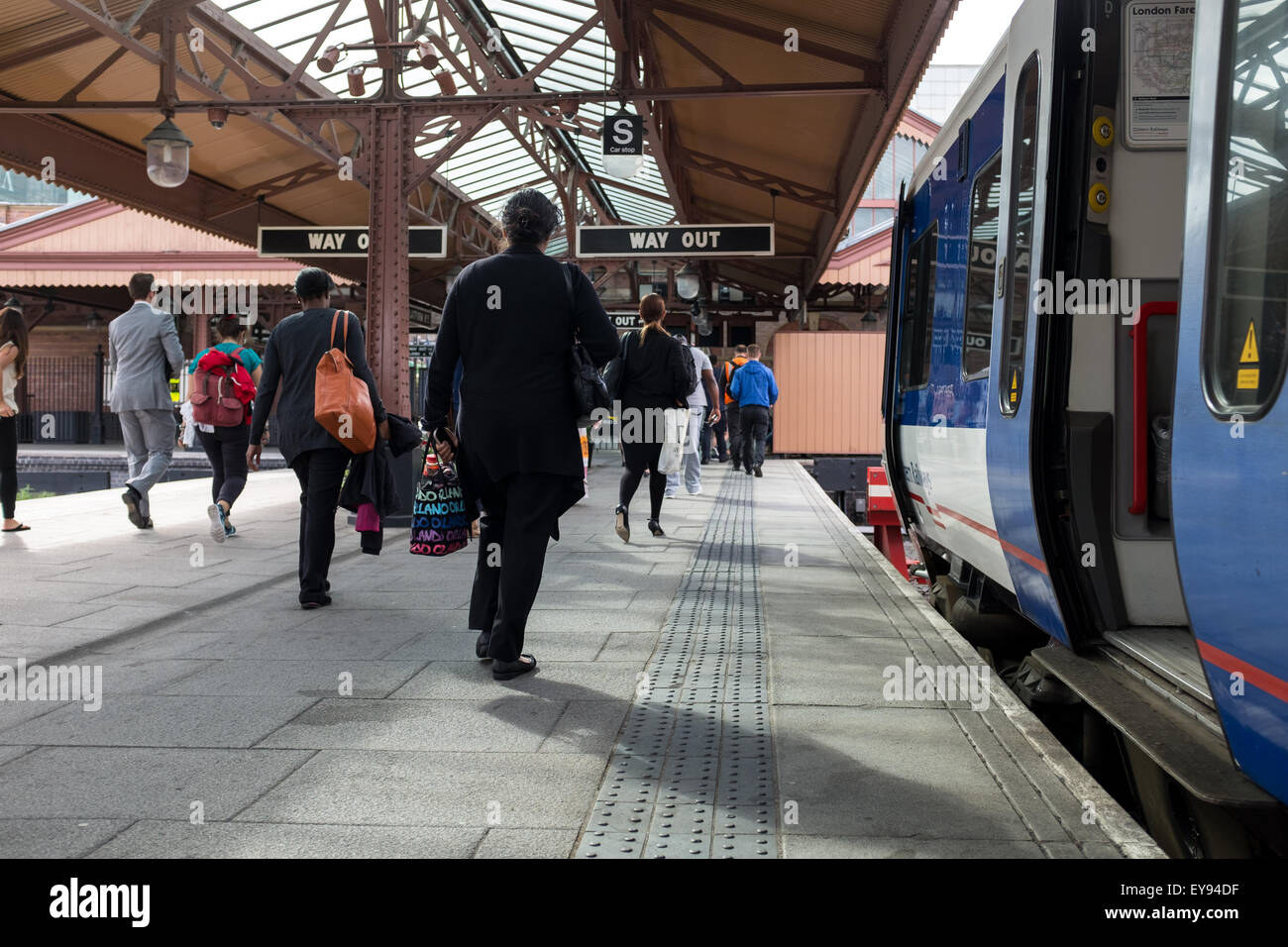 Passengers at Moor Street train station Stock Photo - Alamy