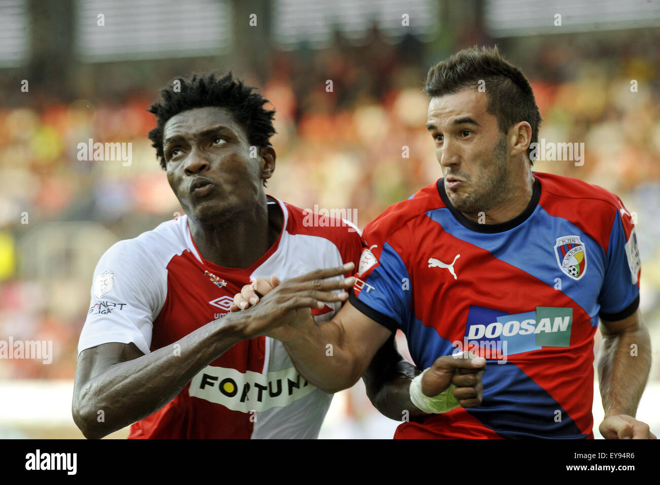 From left Simon Deli of Slavia and Aidin Mahmutovic of Plzen in action ...