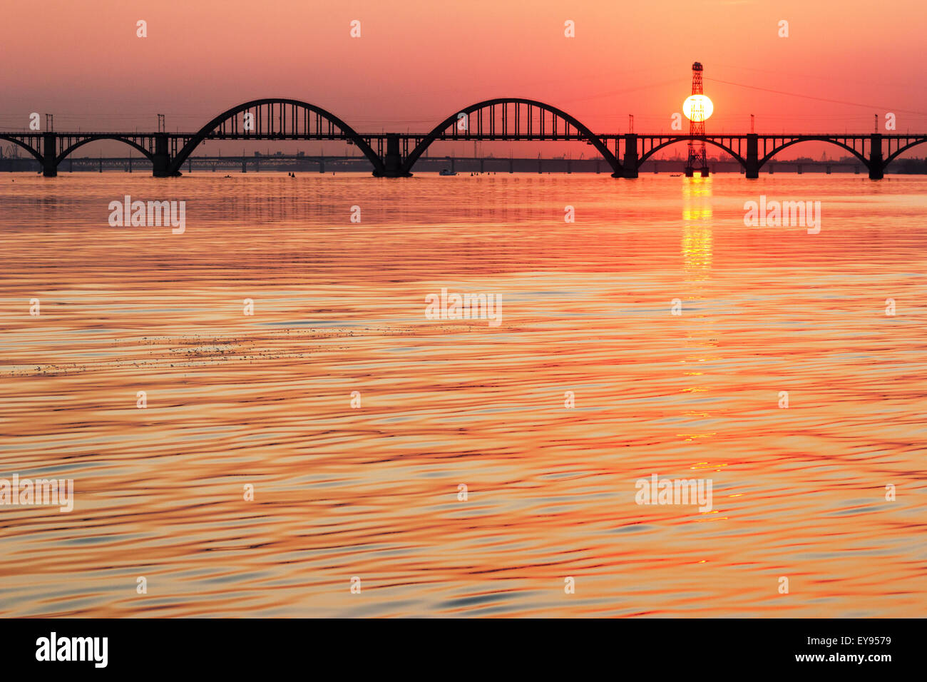 Sunset over river Stock Photo - Alamy