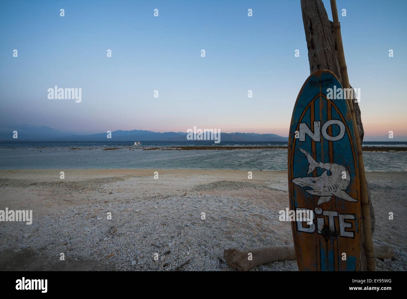 No Bite sign on the beach at dusk, Gili Trawangan, West Nusa Tenggara ...