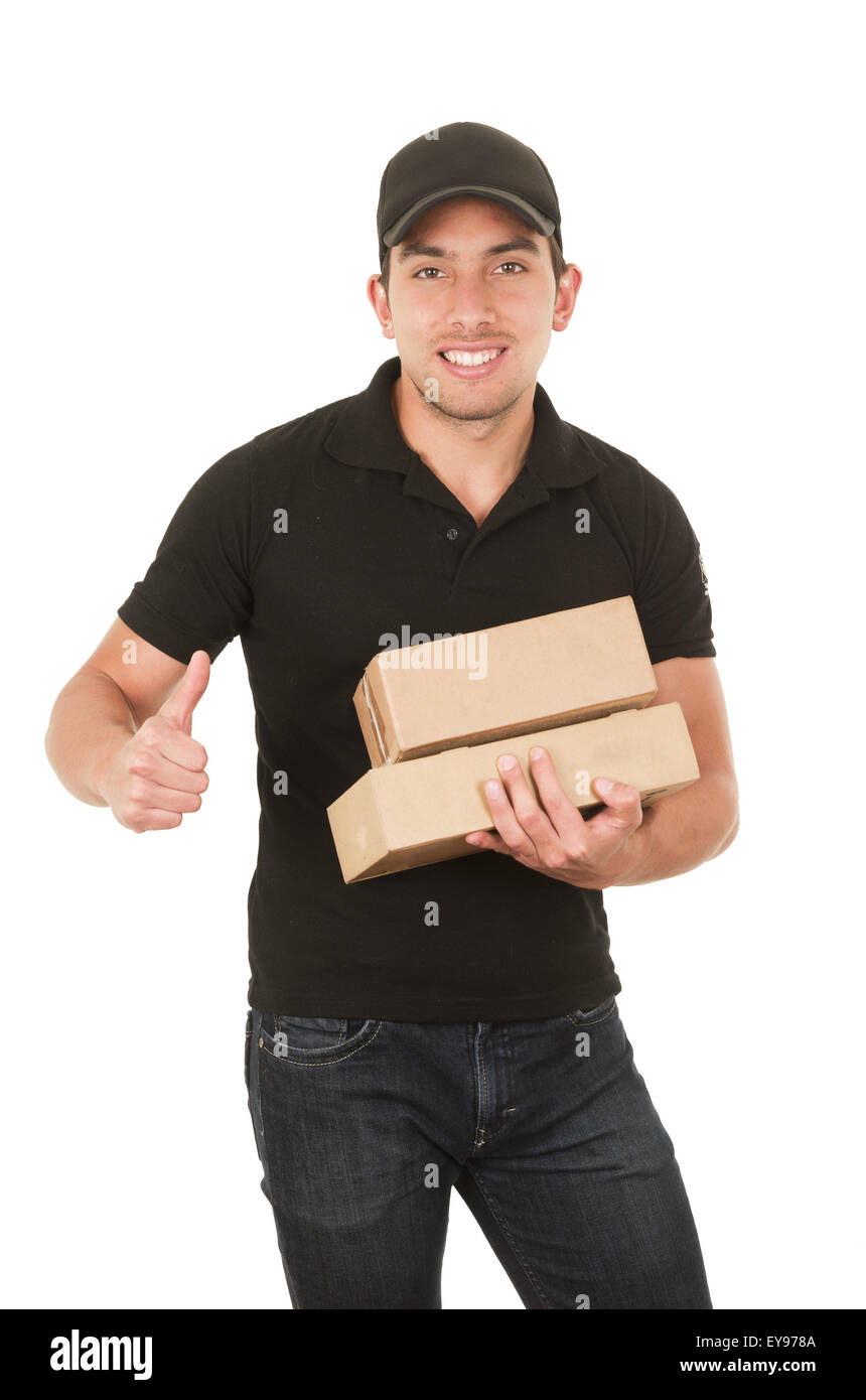 handsome brunette courier man holding packages Stock Photo - Alamy