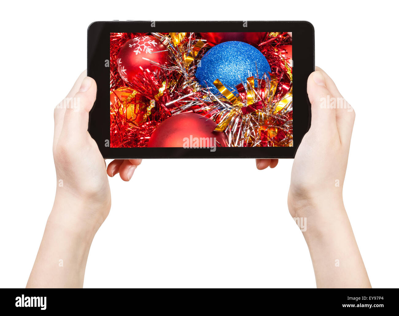 take photo of red Christmas decorations with tablet pc isolated on ...