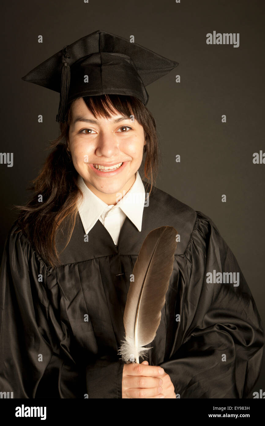 Young woman in graduation cap and gown; Edmonton, Alberta, Canada Stock ...