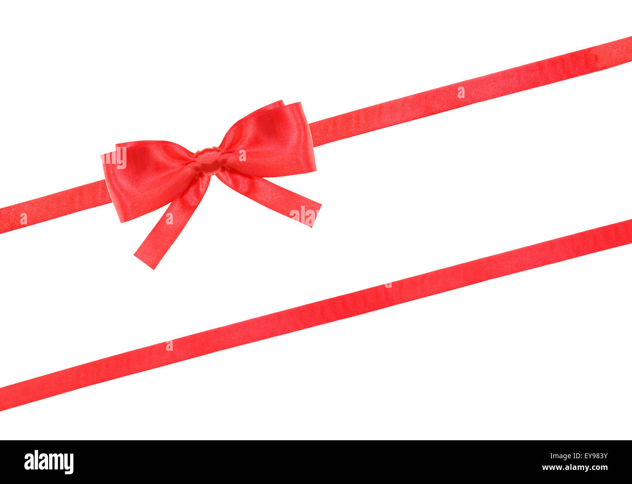 big red satin bow and two diagonal ribbons isolated on horizontal white ...