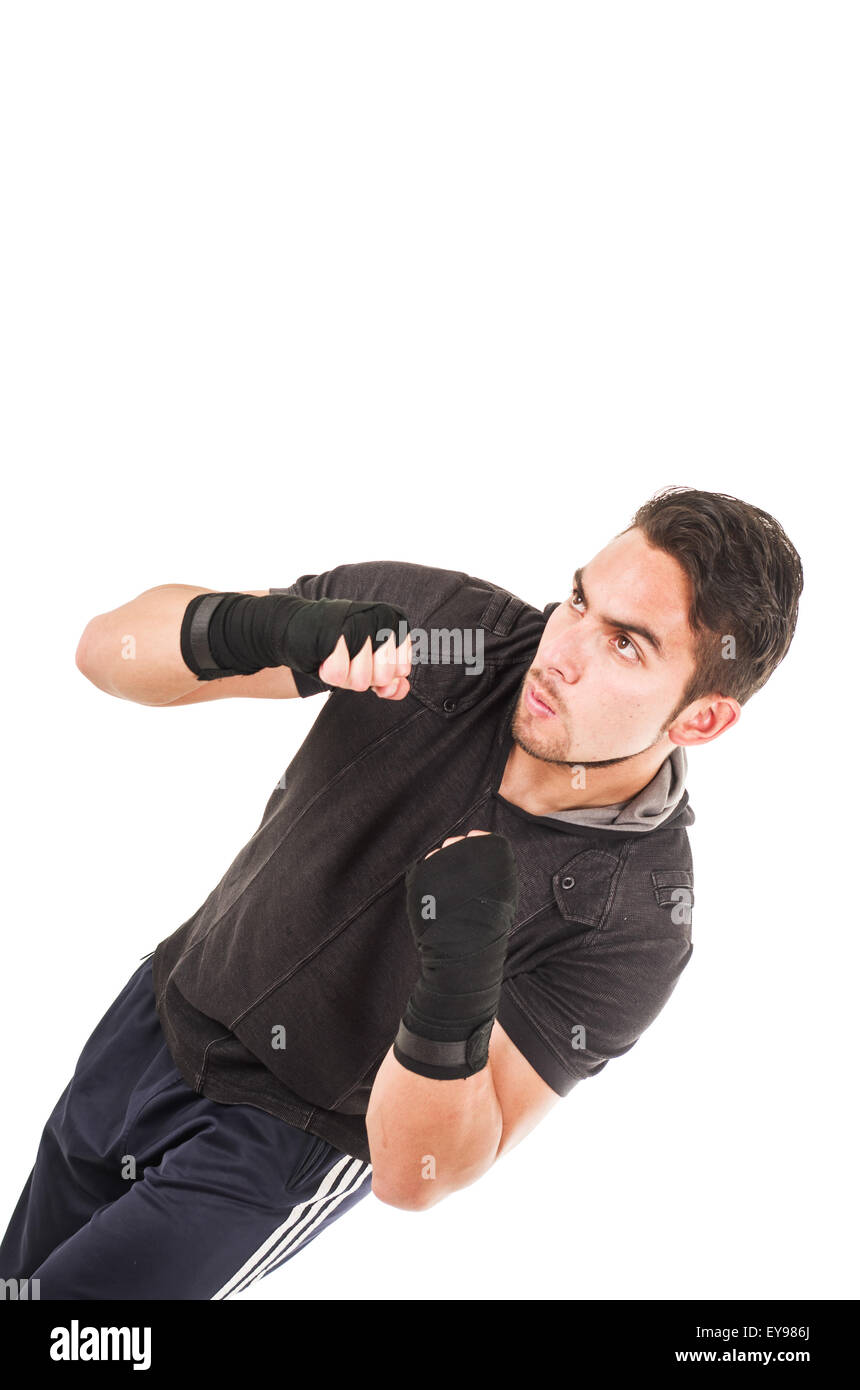 handsome latin fighter wearing black clothes training Stock Photo - Alamy