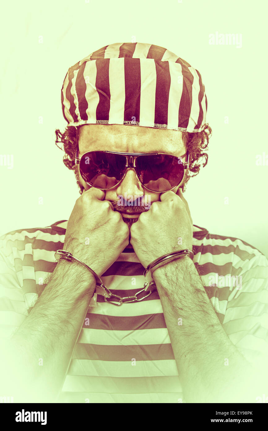 Penitentiary, Desperate, portrait of a man prisoner in prison garb ...