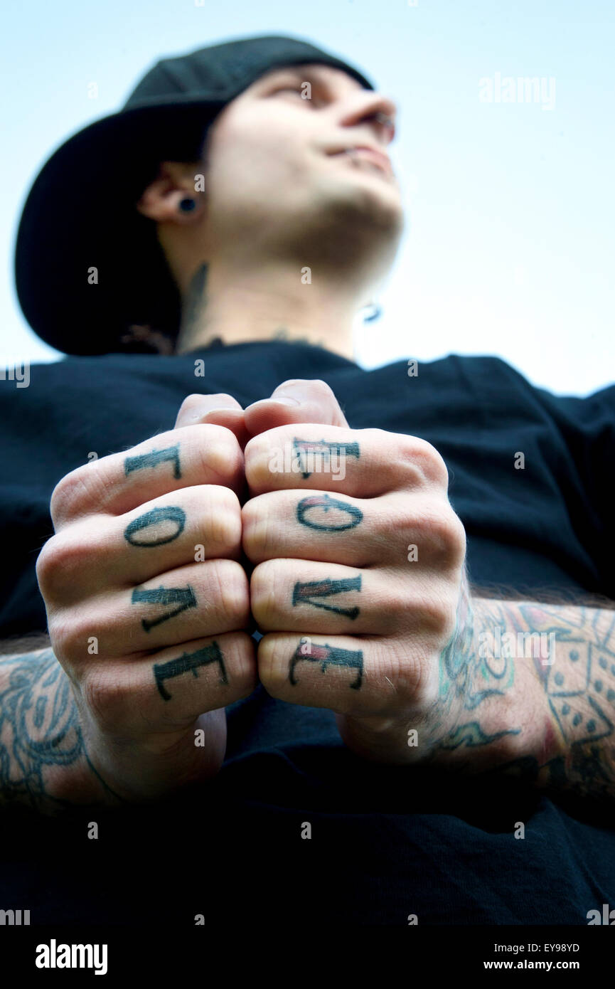 Band member with love tattoos Stock Photo - Alamy