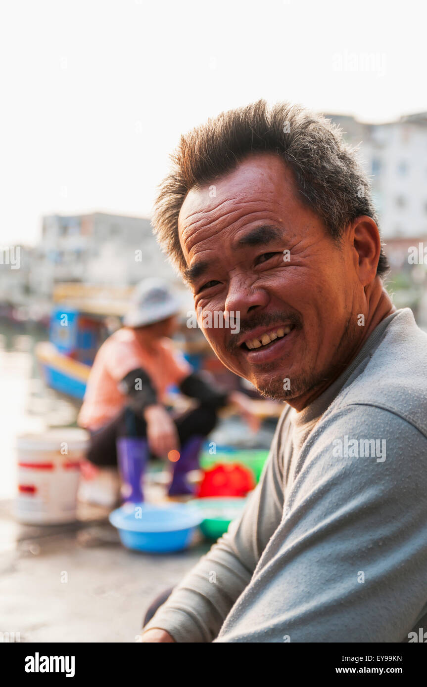 Portrait of fisherman in the traditional Shapowei; Xiamen, Fujian ...