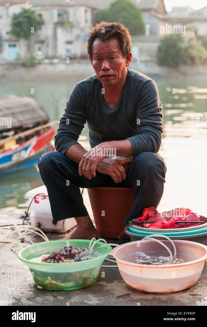 Portrait of fisherman in the traditional Shapowei; Xiamen, Fujian ...
