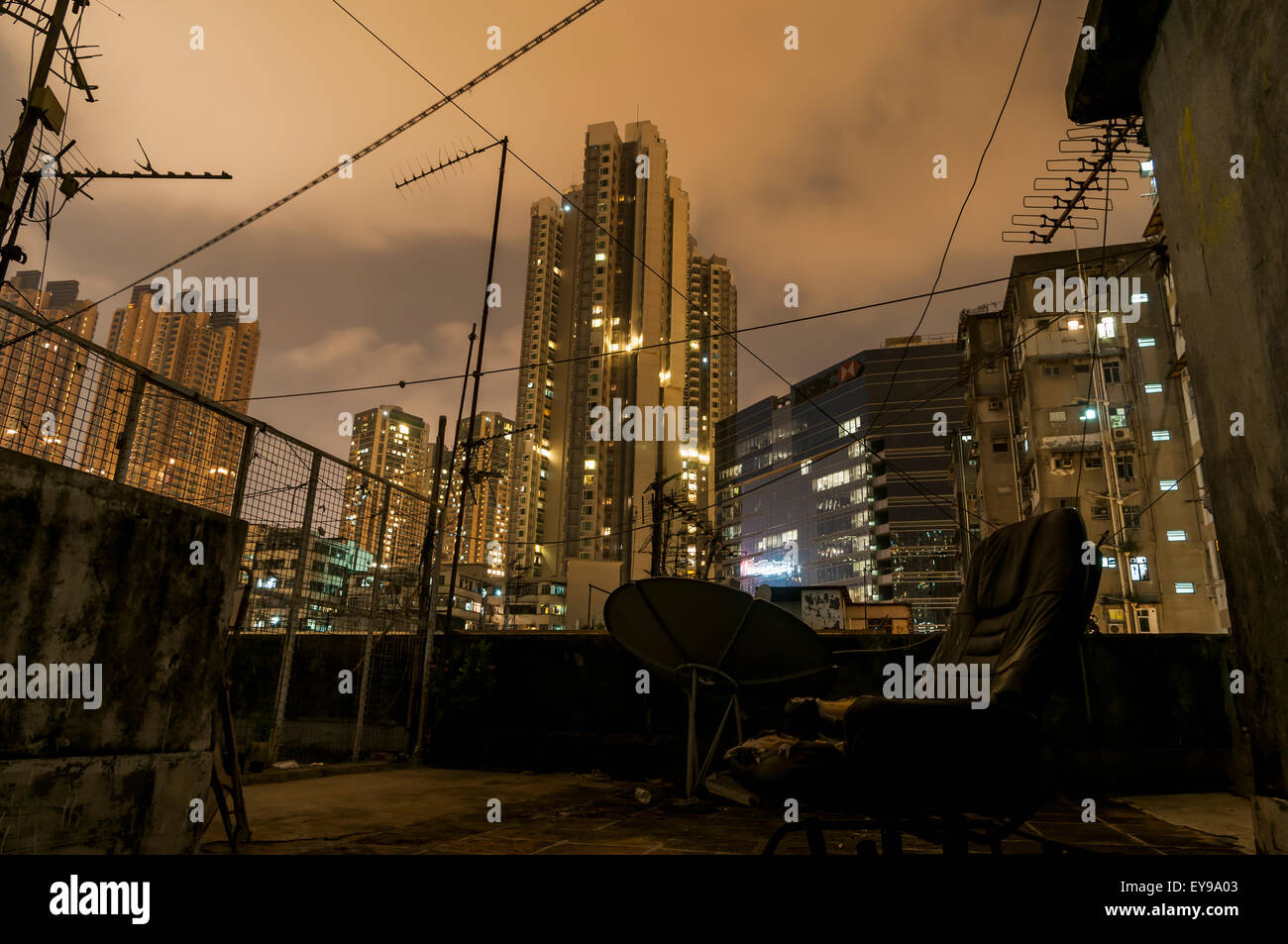 Rooftop of an old apartment with a view of other residential buildings ...
