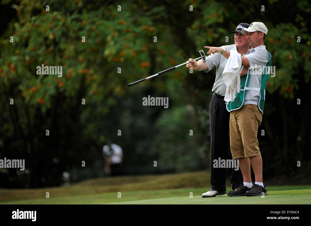 Sunningdale, UK. 23rd July, 2015. Ronan Rafferty of NIR surveys the ...