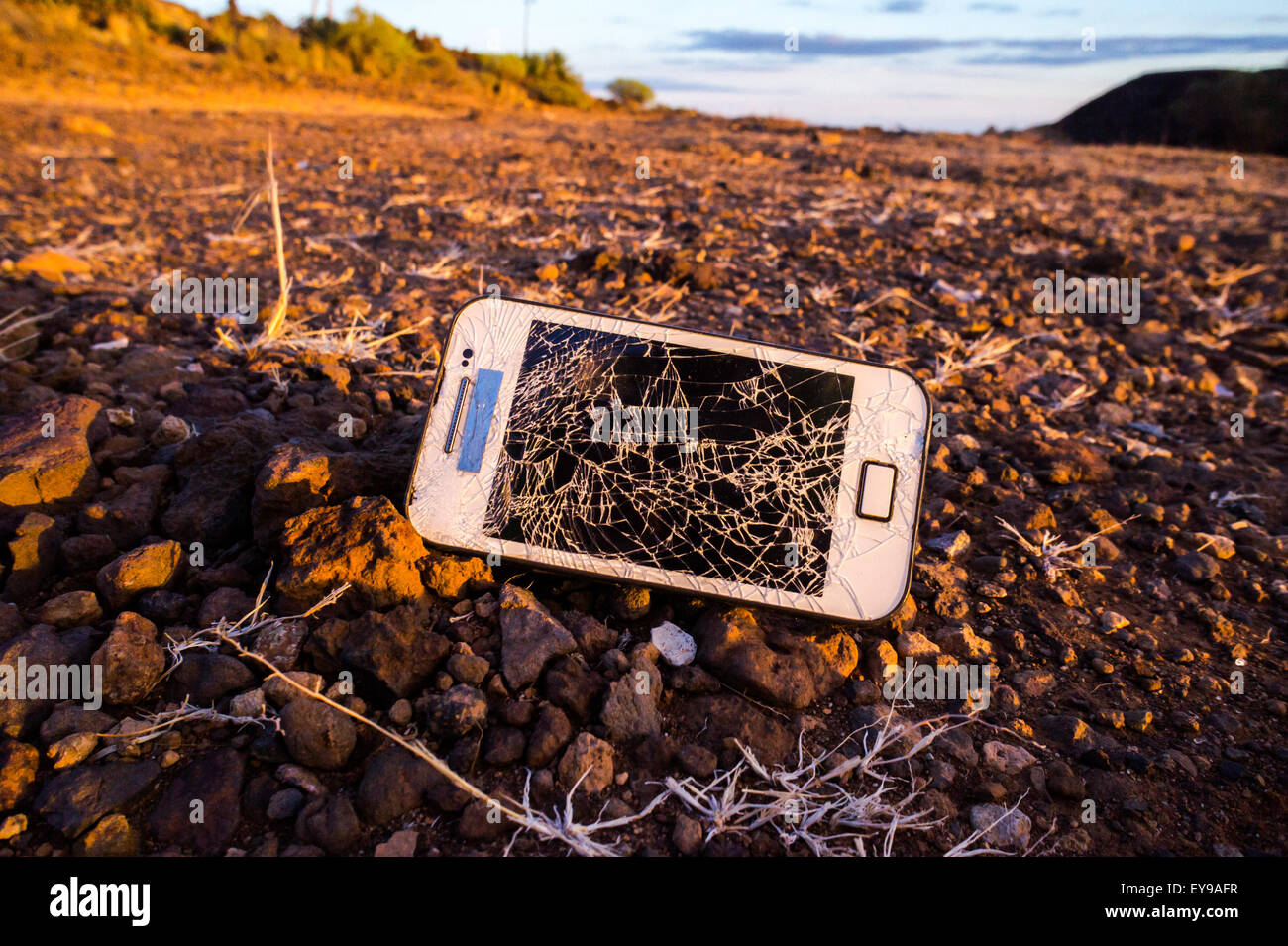 White Smartphone with Broken Display Stock Photo - Alamy