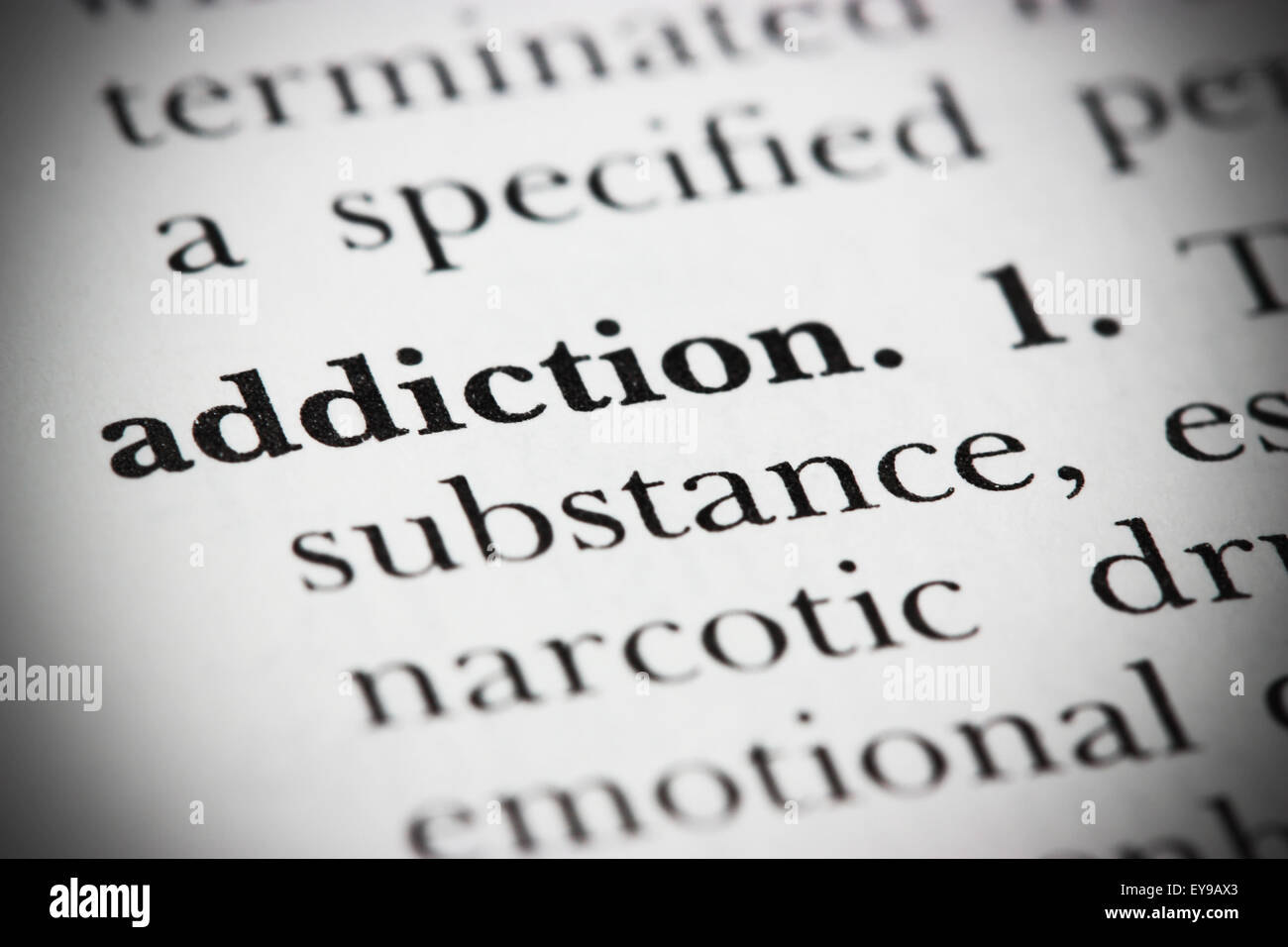 Close up of a dictionary word “addiction” Stock Photo - Alamy