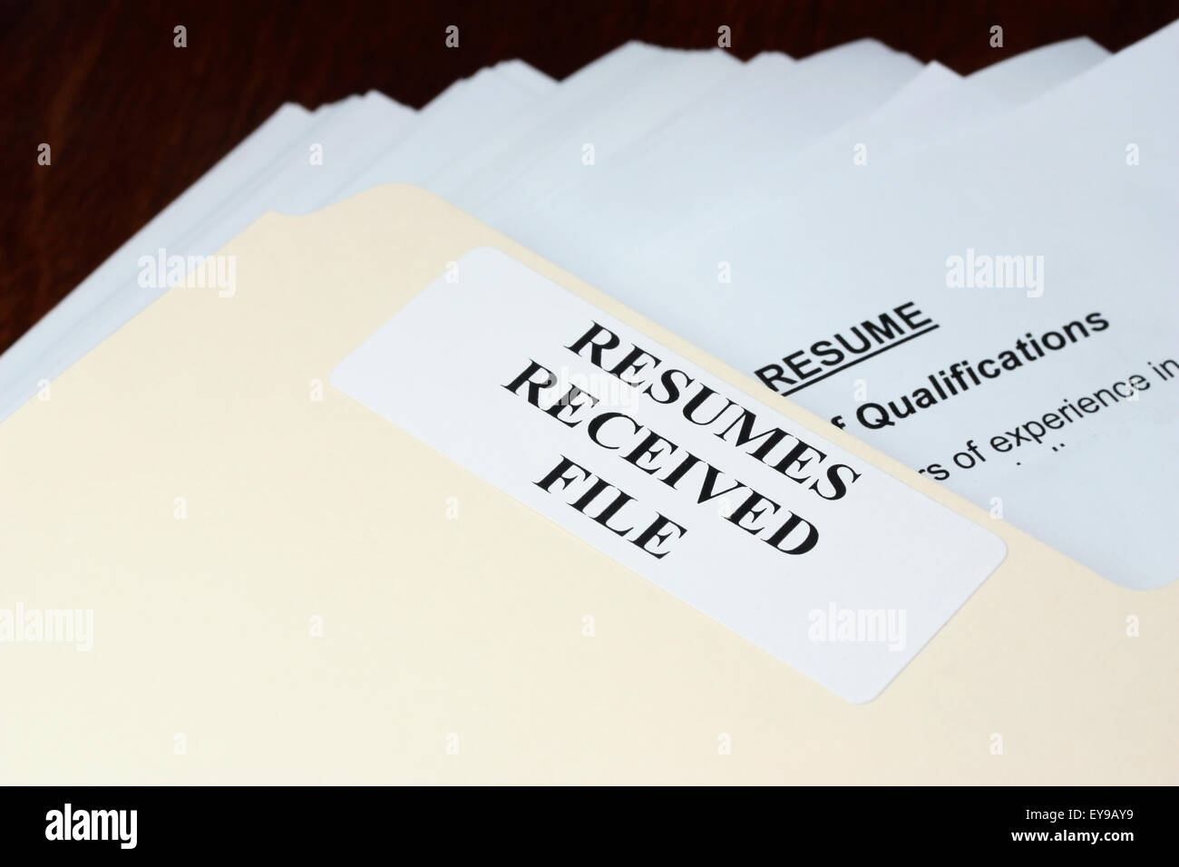 File with stack of resumes received Stock Photo - Alamy