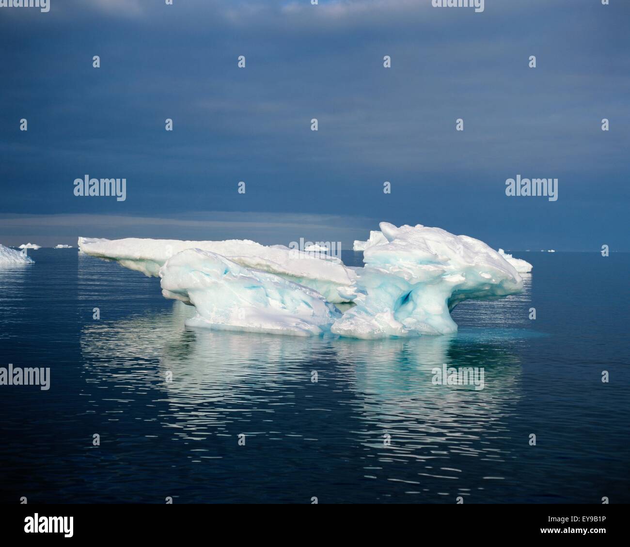 Iceberg And Reflection In Sea Stock Photo - Alamy