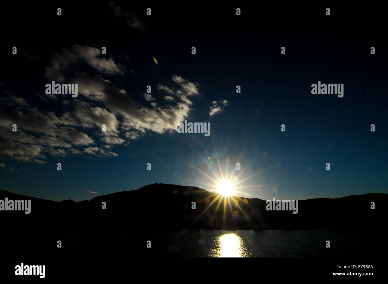 Dramatic Sunset Rays Stock Photo - Alamy