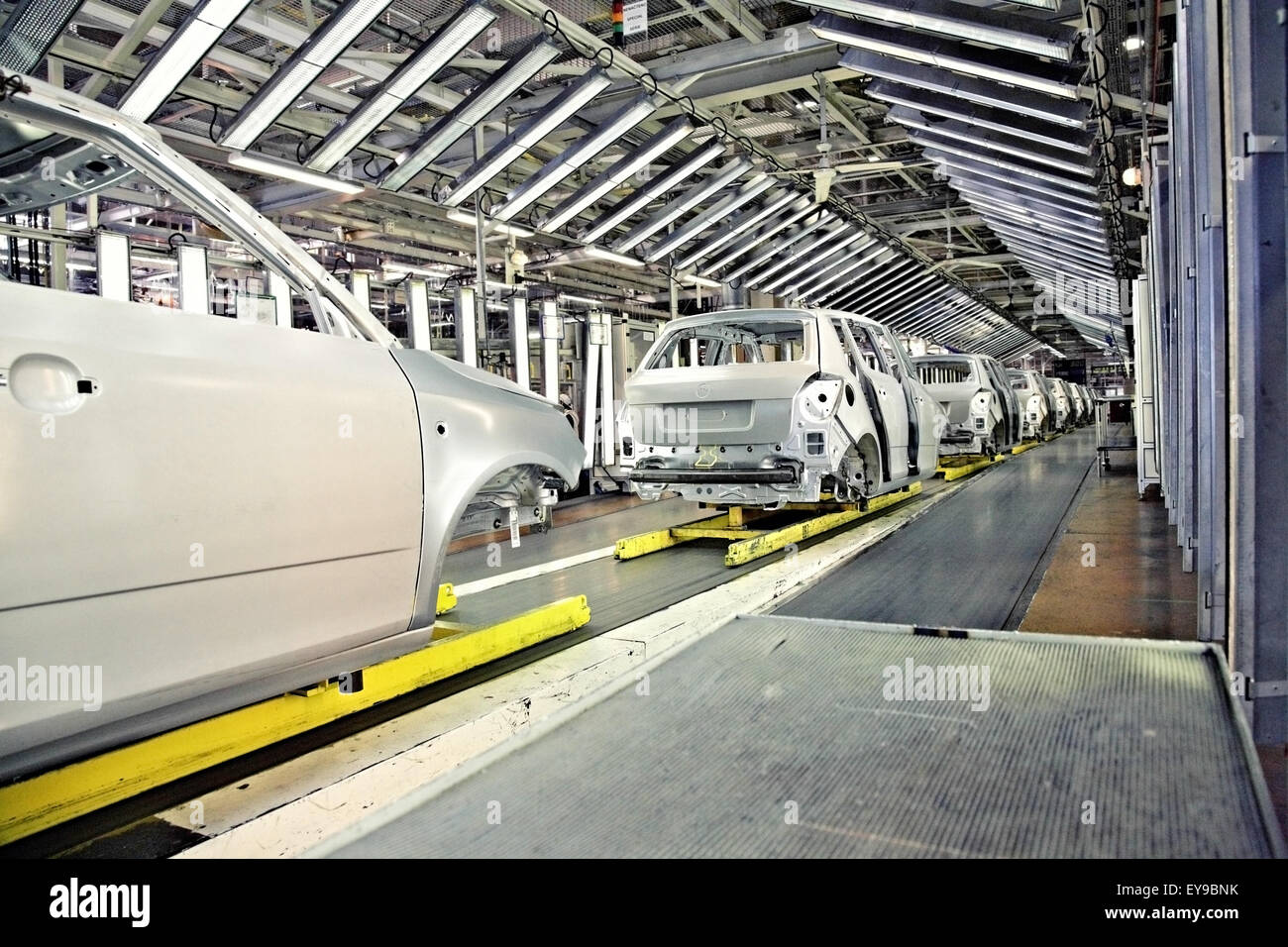 cars in a row at car plant Stock Photo - Alamy